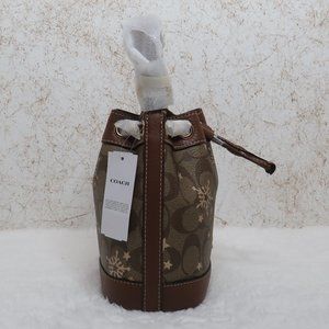 Coach | Bags | Coach Dempsey Star Snowflake Print Drawstring Bucket Bag ...